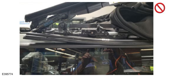 Rear/side window scratches or distortions (Non-warrantable) (Figures 30-32)